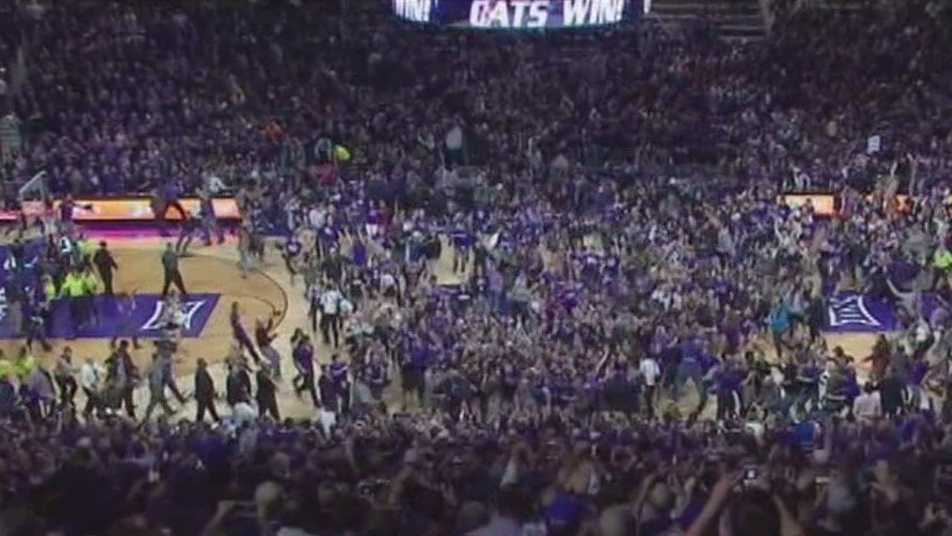 Images: K-State fans rush the court after upset win over KU