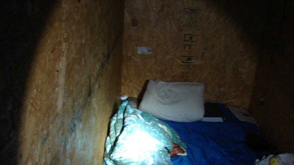 Police release disturbing photos of box where woman held captive