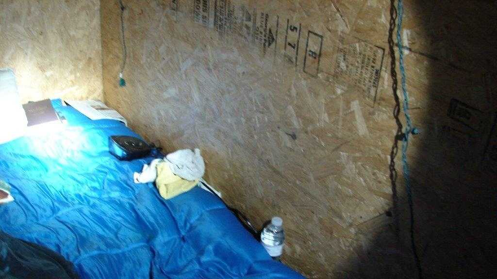 Police release disturbing photos of box where woman held captive