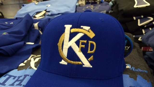 Long lines form for commemorative KCFD hats, T-shirts