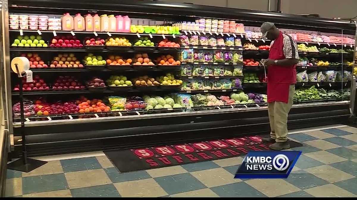 Grocery store damaged in fatal fire reopens
