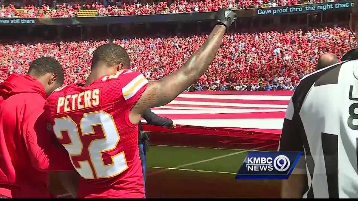 Chiefs lock arms, Peters raises fist during anthem