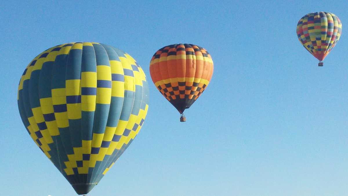 Balloons aloft over Albuquerque day before Balloon Fiesta