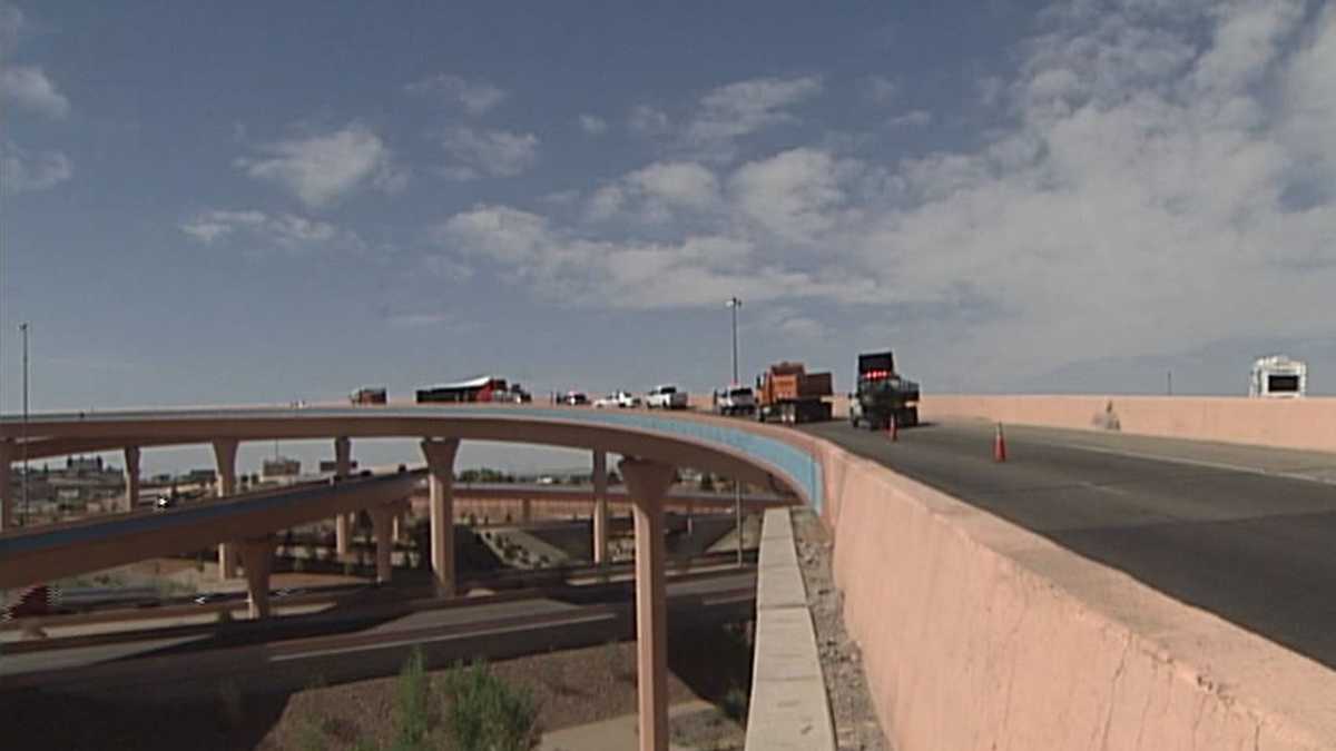 Photos: Semi nearly rolls off Big I interchange