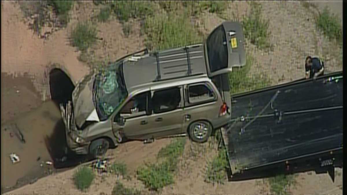 PHOTOS: Minivan crashes into ditch