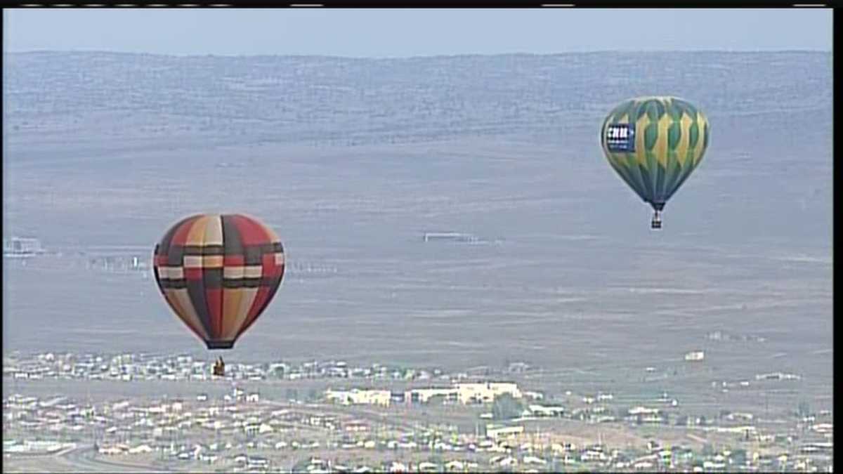 PHOTOS: Balloons fly on gloomy Friday morning