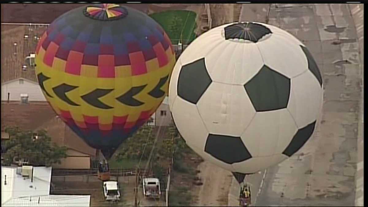 PHOTOS: Balloons fly on gloomy Friday morning