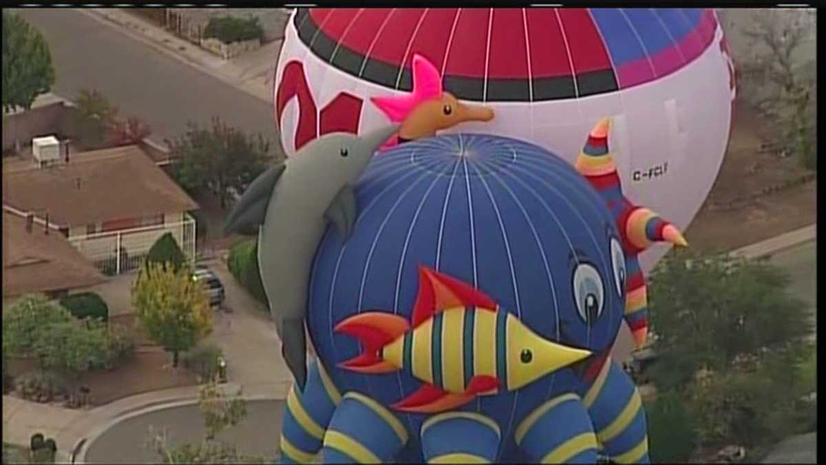 PHOTOS: Balloons fly on gloomy Friday morning