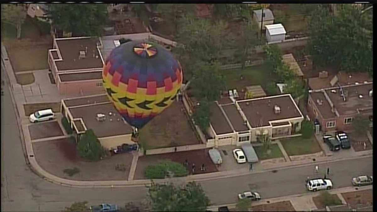 PHOTOS: Balloons fly on gloomy Friday morning
