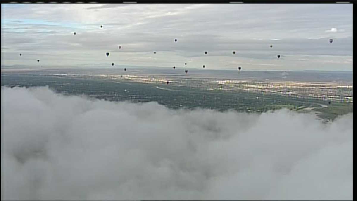 PHOTOS: Balloons fly on gloomy Friday morning