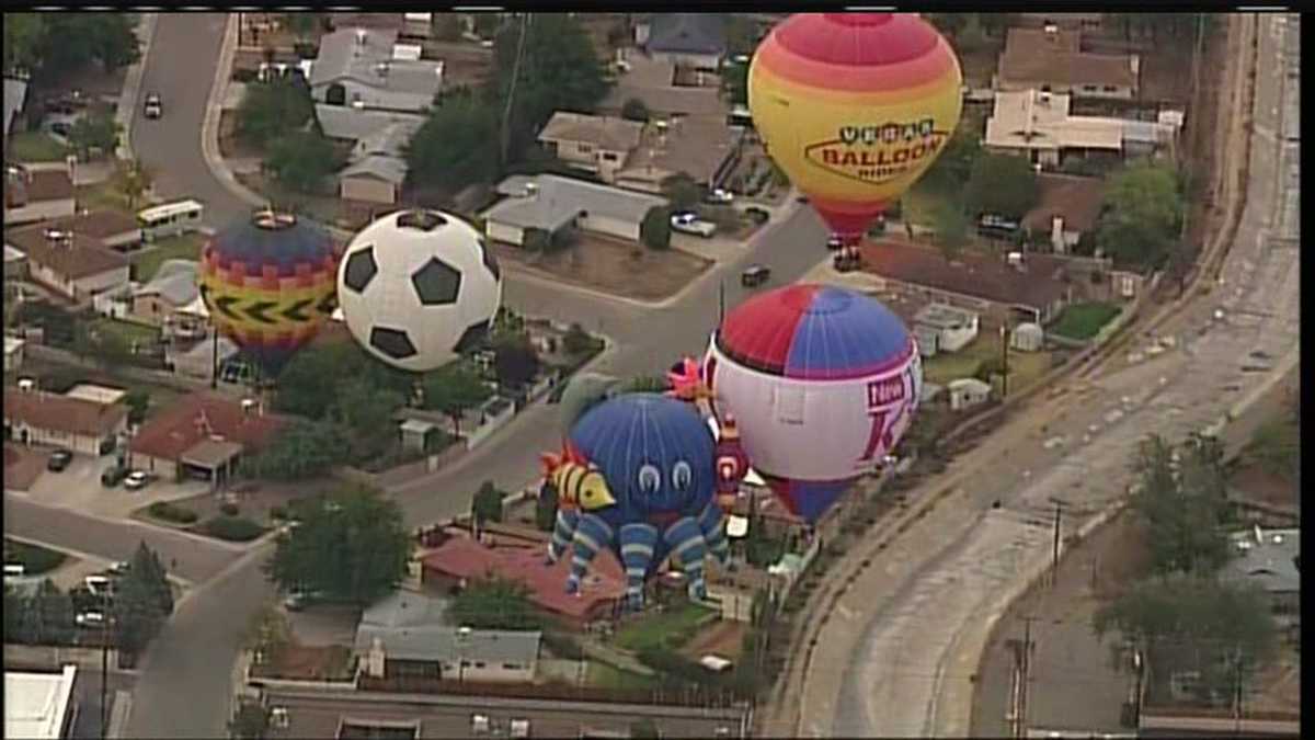 PHOTOS: Balloons fly on gloomy Friday morning