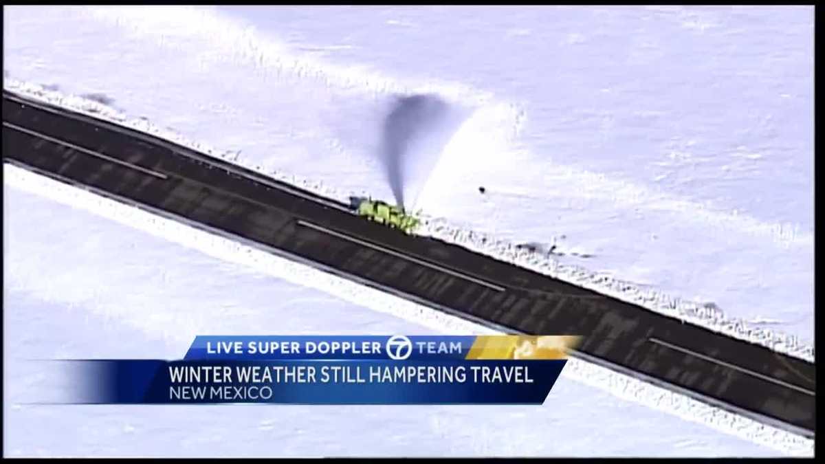 Sun melts snow on Roswell streets