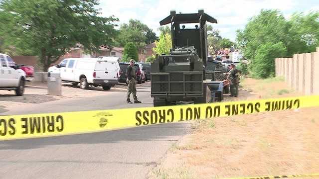 Police: Son shot father before Rio Rancho standoff