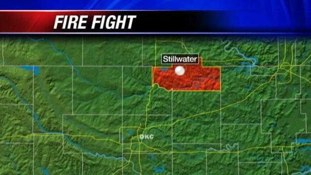 Firefighters monitor hotspots in Stillwater wildfire