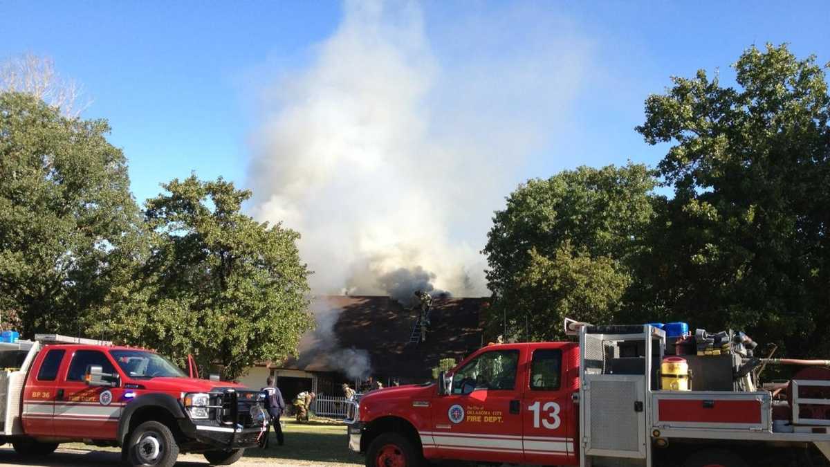Photos: Fire burns two-story home