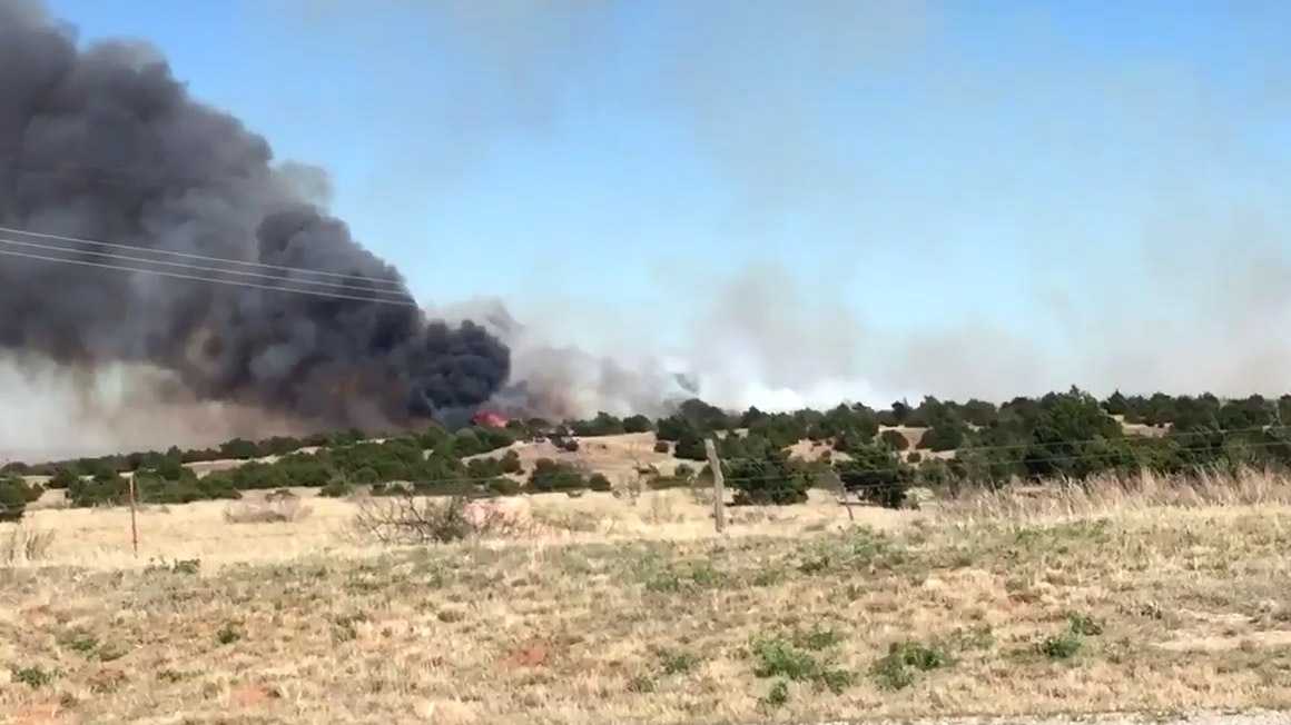 Crews battle grass fire in Fairview