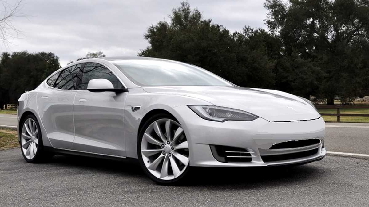 First Tesla electric sedans hit the road