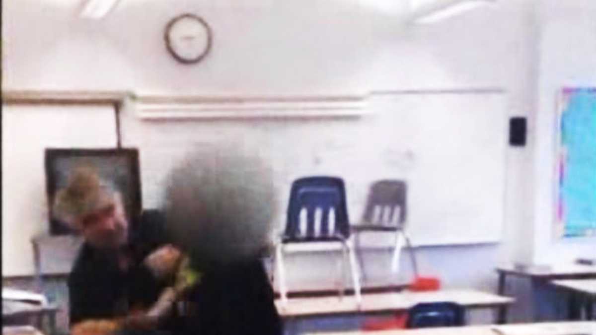 Teacher who scuffled with student returns to work