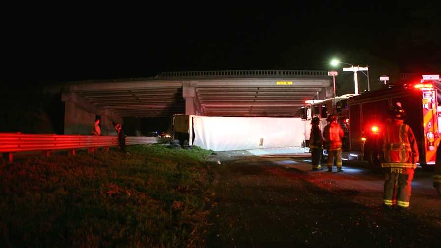 PHOTOS: Big-rig flips over Santa Cruz fishhook bridge