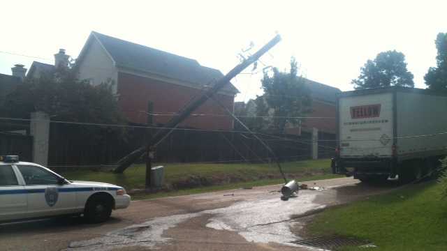 Truck hits power lines