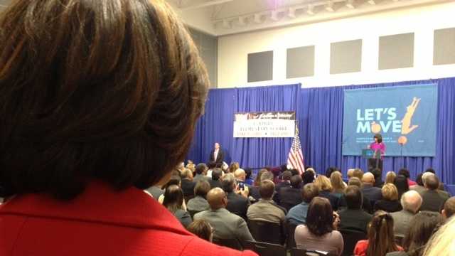 Images: Michelle Obama, Rachael Ray visit Clinton
