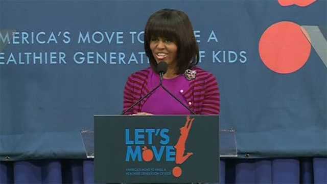 Images: Michelle Obama, Rachael Ray visit Clinton