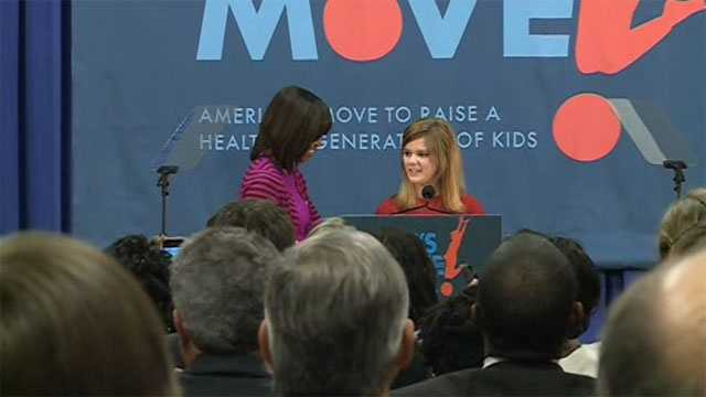 Images: Michelle Obama, Rachael Ray visit Clinton