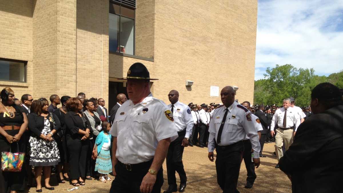 Images: Mourners gather to remember slain JPD officer