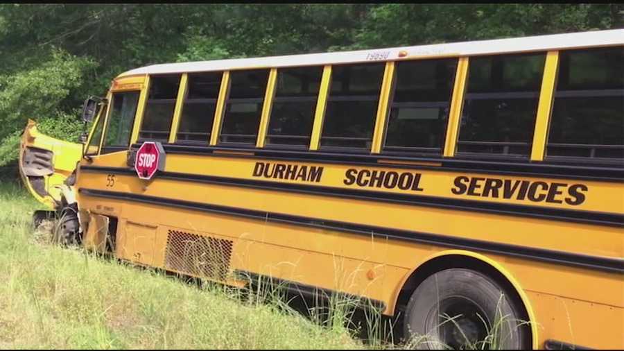 1 school bus in ditch after 2 buses collide