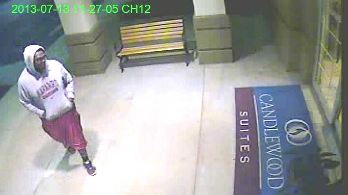 Police: Surveillance photos show armed robbery suspect