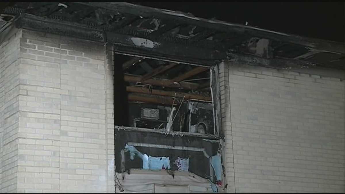 Officers pull unconscious tenant from burning apartment building