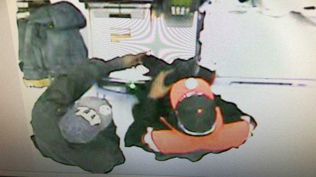 Surveillance cameras capture burglary suspects