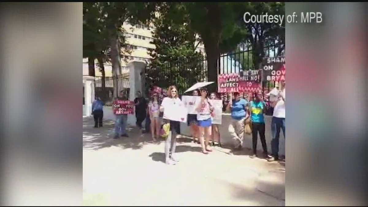 Religious freedom law goes into effect, sparking protests