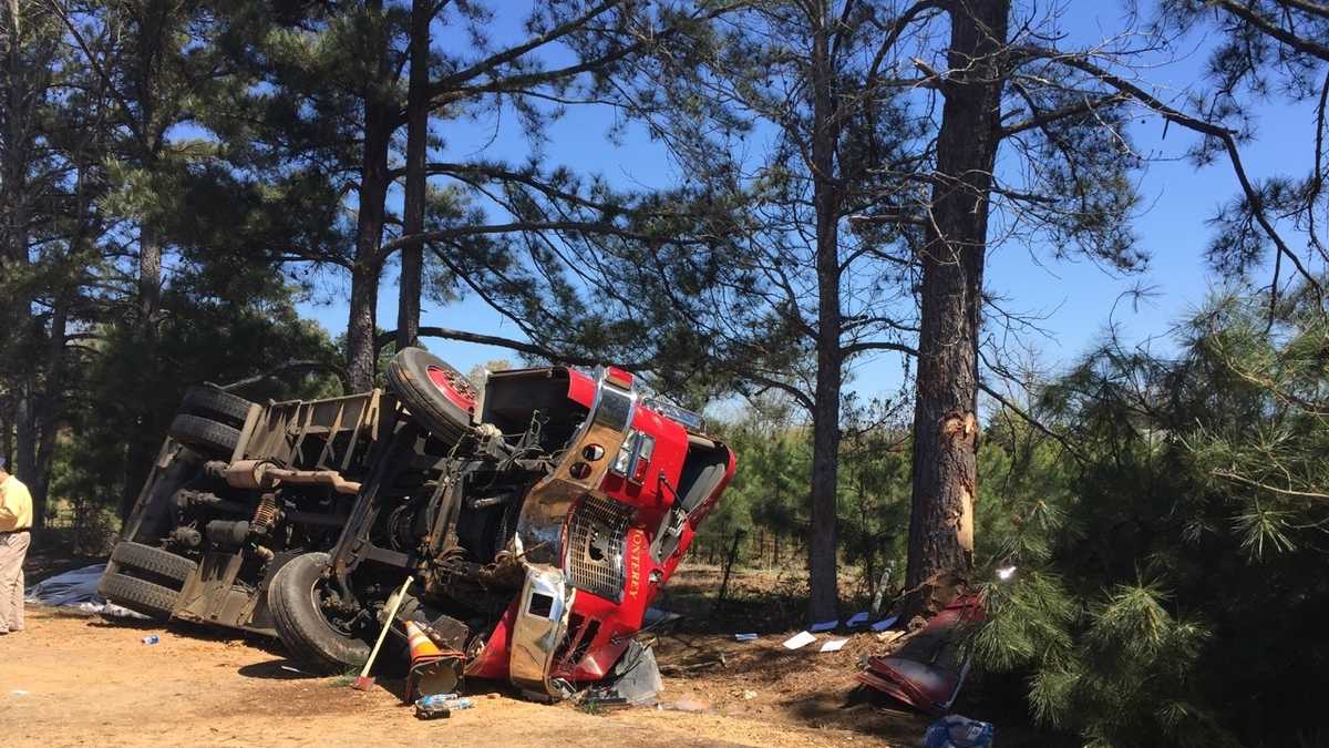 Firefighter fights for life after flipping truck