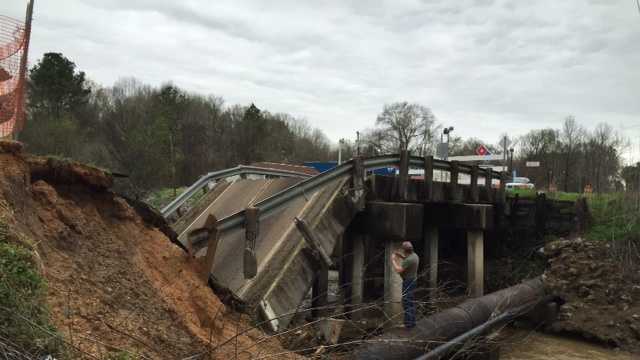 Bridge collapses amid flooding