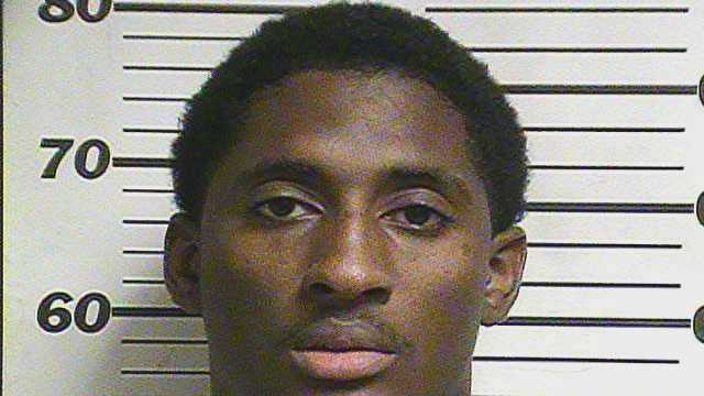 Man arrested in death of retired postal worker