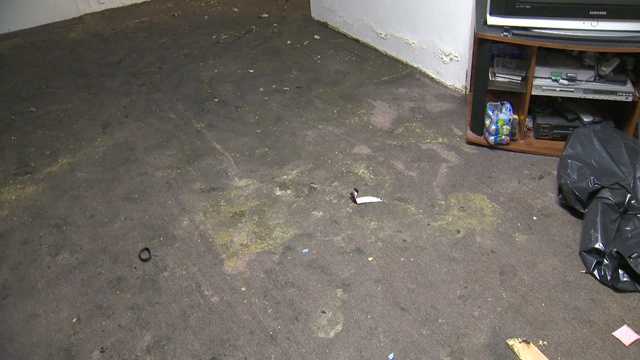 In photos: Sewage muddies several houses