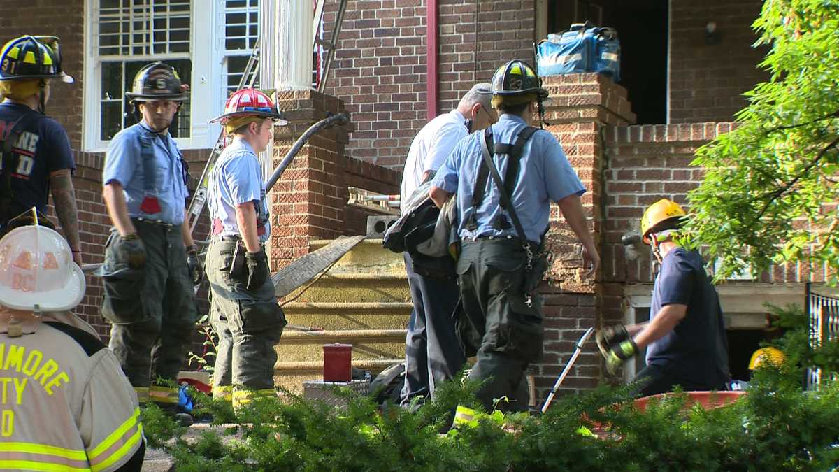 Images: Porch collapse drops 2 into basement