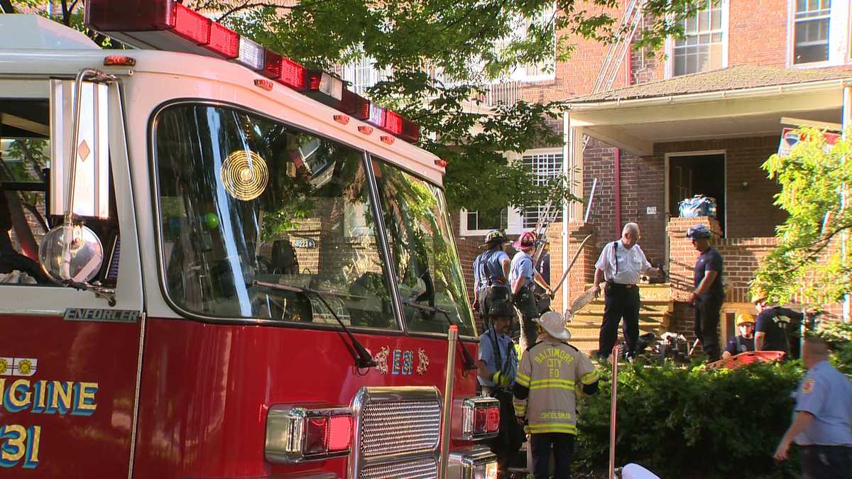 Images: Porch collapse drops 2 into basement