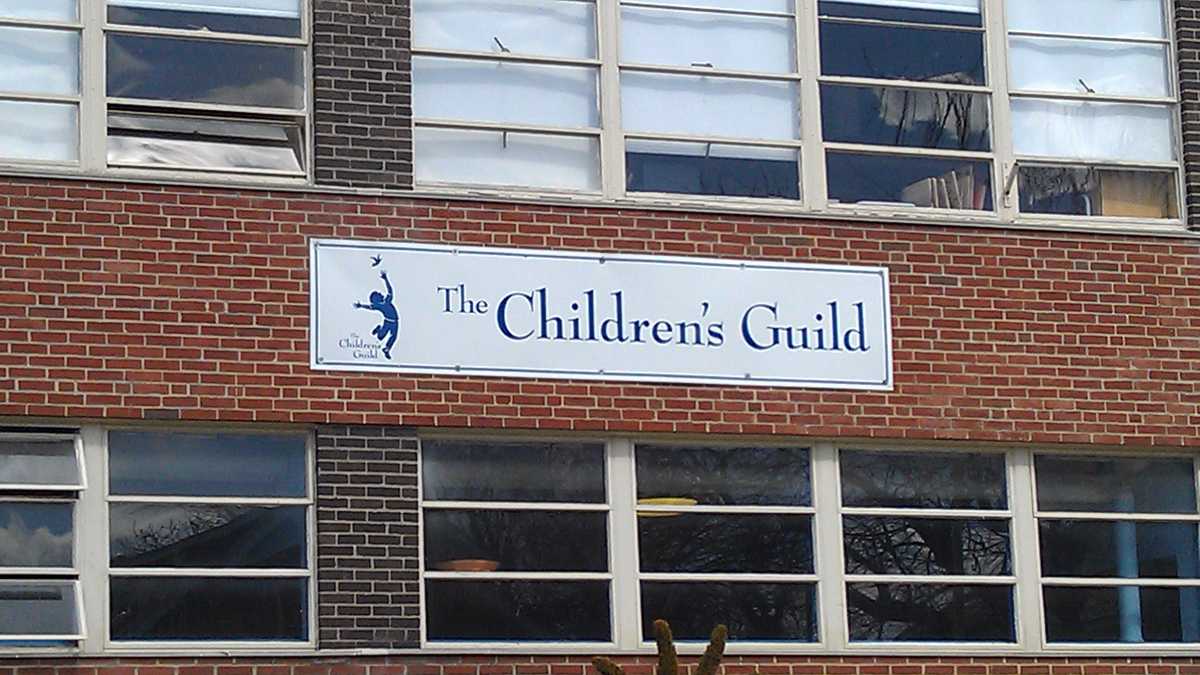 Images: Therapy dog helps kids at The Children's Guild