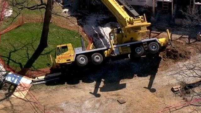 Photos: Crane falls over in UMBC construction area