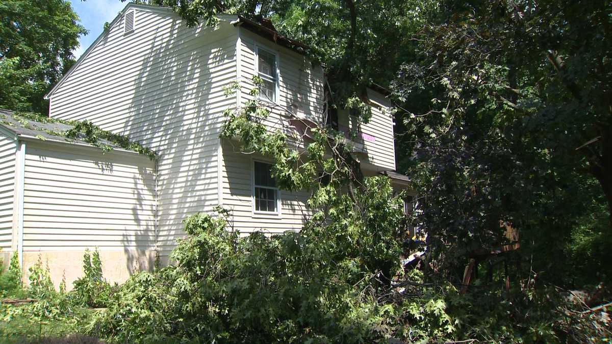 Images: Storms destroy buildings, uproot trees, flood streets