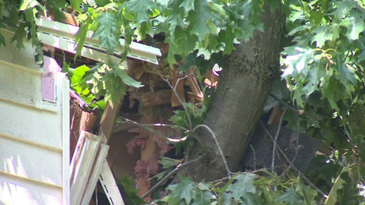 Images: Storms destroy buildings, uproot trees, flood streets