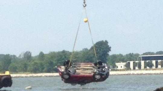 Images: Car removed after falling from bridge