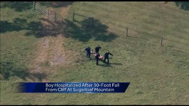 Boy hospitalized after 30-foot fall from cliff
