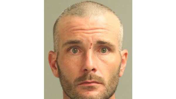 Man arrested on stolen vehicle, burglary charges