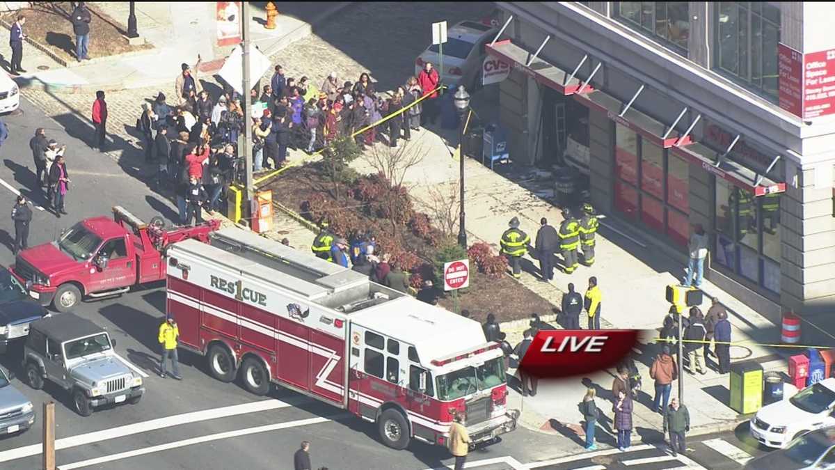 Images: SUV crashes into downtown Baltimore CVS