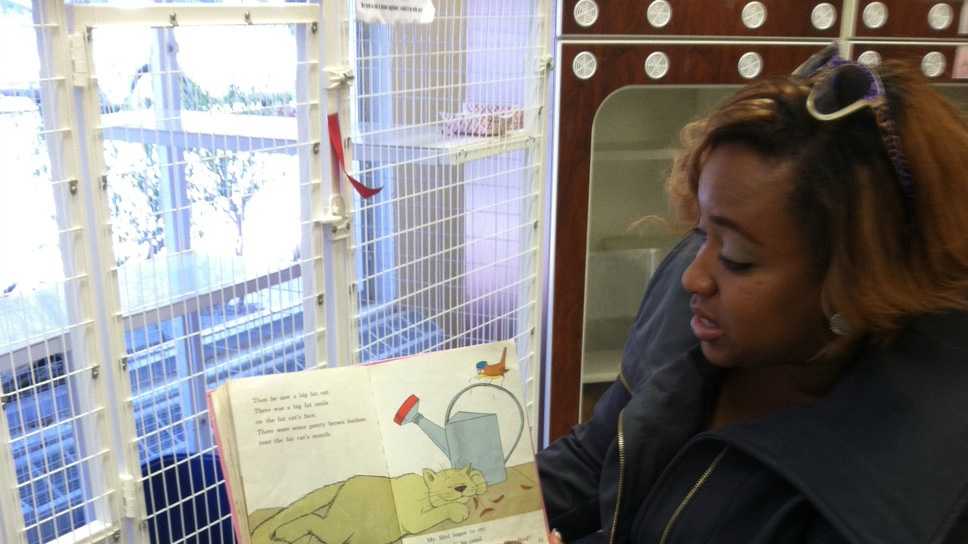 Photos: Kids read to homeless pets, improve skills