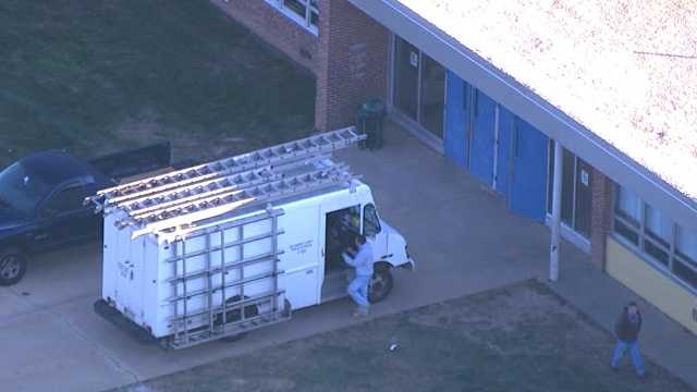 Photos: SUV crashes into Edgemere school