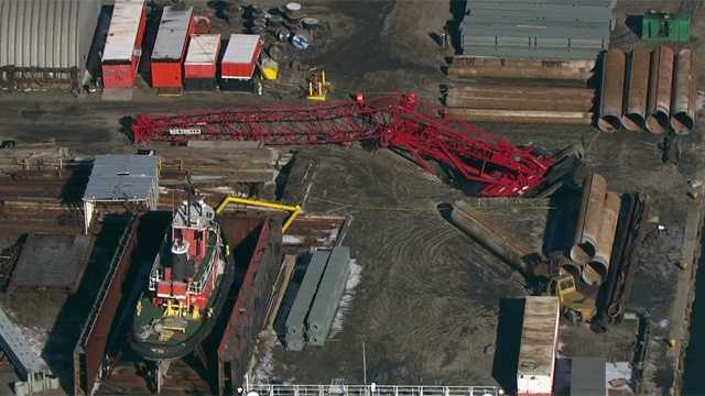 Images: Crane topples over in Curtis Bay